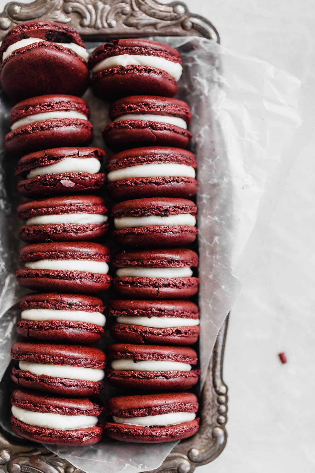 Red Velvet Macarons with cream cheese frosting - Broma Bakery