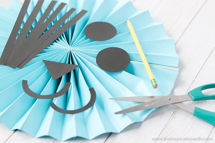 Cat Head Paper Fan Craft for Your Cat Party - The Inspiration Edit