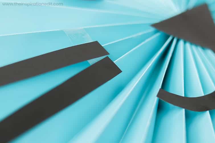 Cat Head Paper Fan Craft for Your Cat Party - The Inspiration Edit